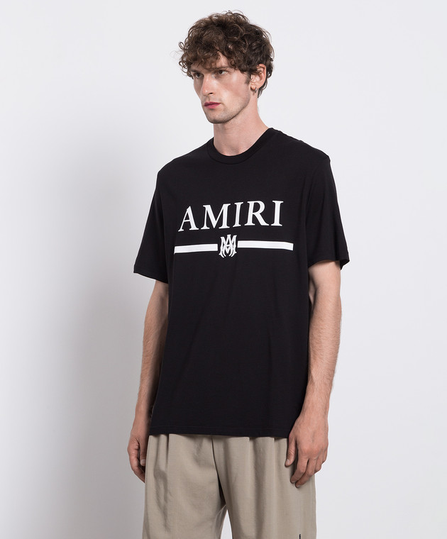 AMIRI - Camiseta negra con logo estampado texturizado PXMJL001 comprar ...