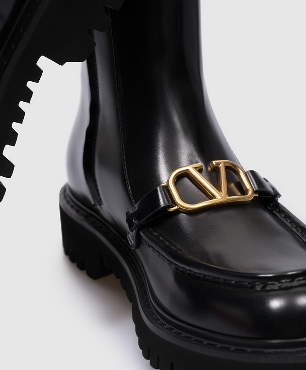 Valentino - Black leather boots with metallic VLogo Signature logo ...