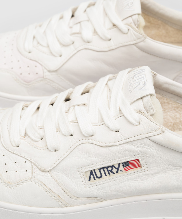 AUTRY - White leather sneakers with logo A13IAULMSG10 - shop with ...
