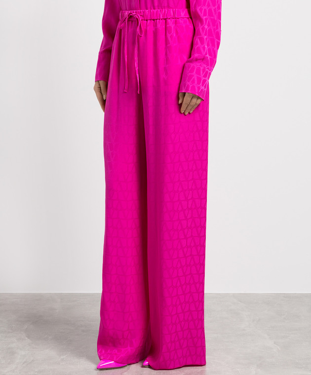 Valentino - Pink silk trousers with Toile Iconographe logo pattern ...